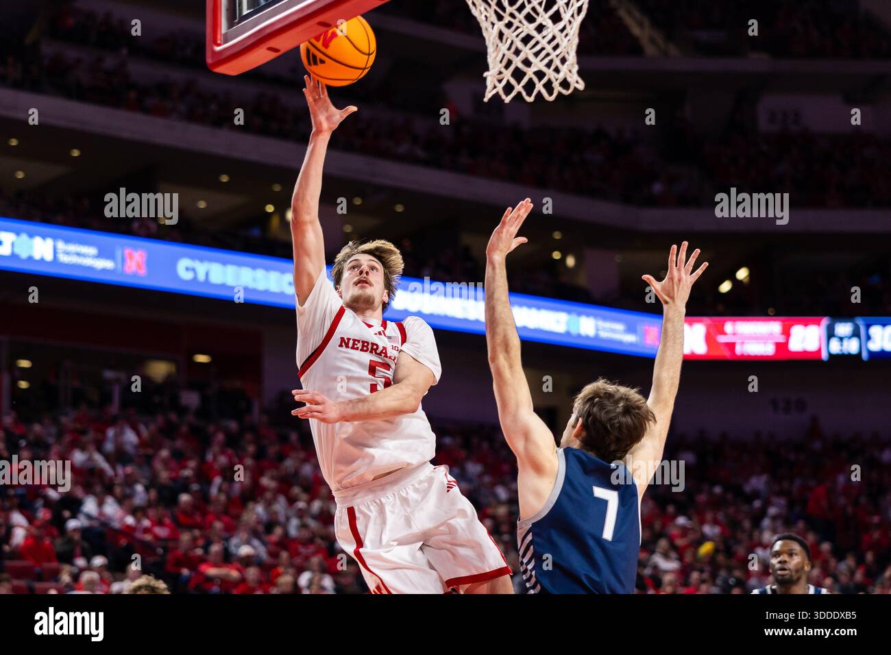 Nebraska forward Braden Frager (5) goes in for a layup against New ...