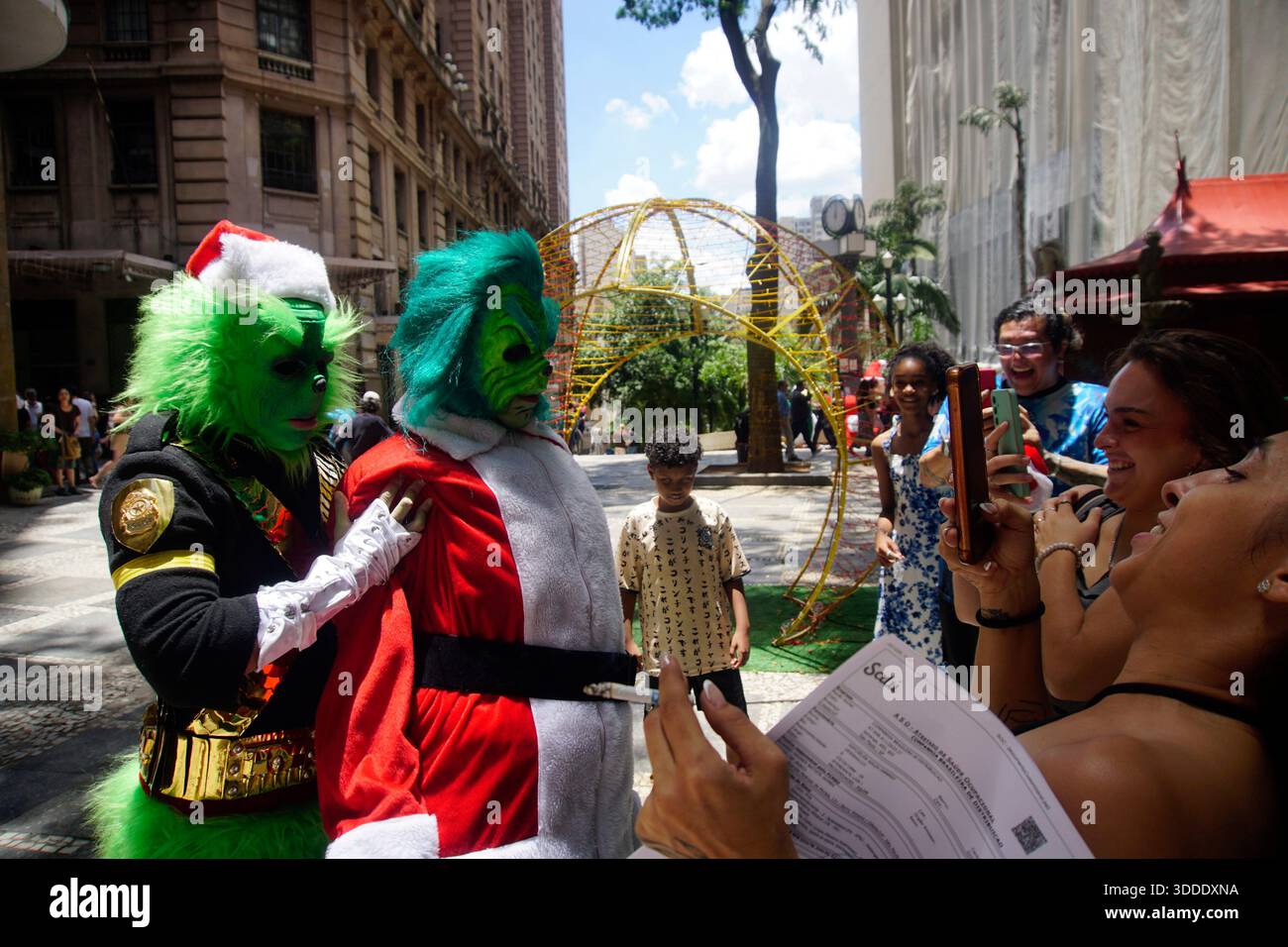 People participate in a Christmas parade in Sao Paulo, Brazil, 24 ...