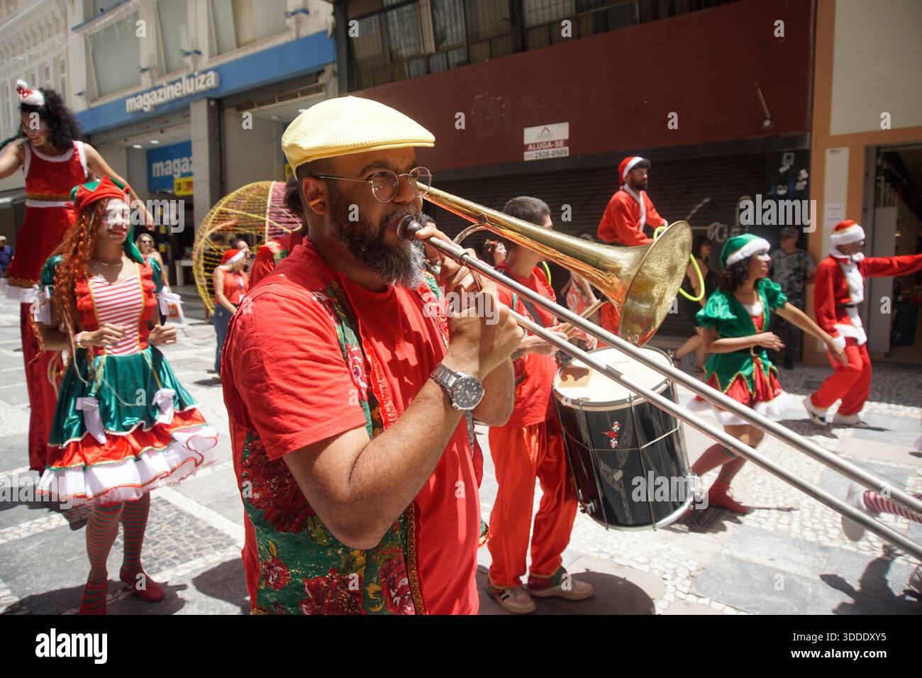 People participate in a Christmas parade in Sao Paulo, Brazil, 24 ...