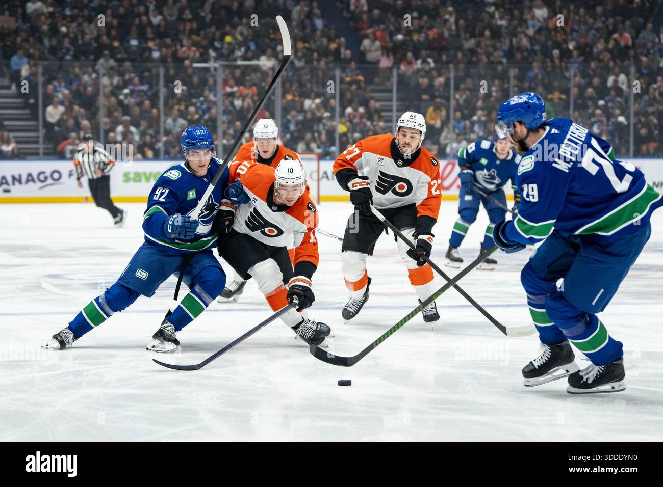 Vancouver Canucks' Liam Ohgren (92), Marcus Pettersson (29 ...