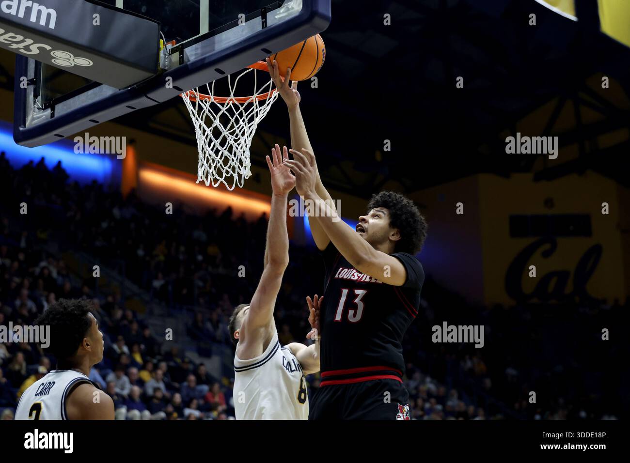 Louisville forward Sananda Fru (13) shoots against California center ...