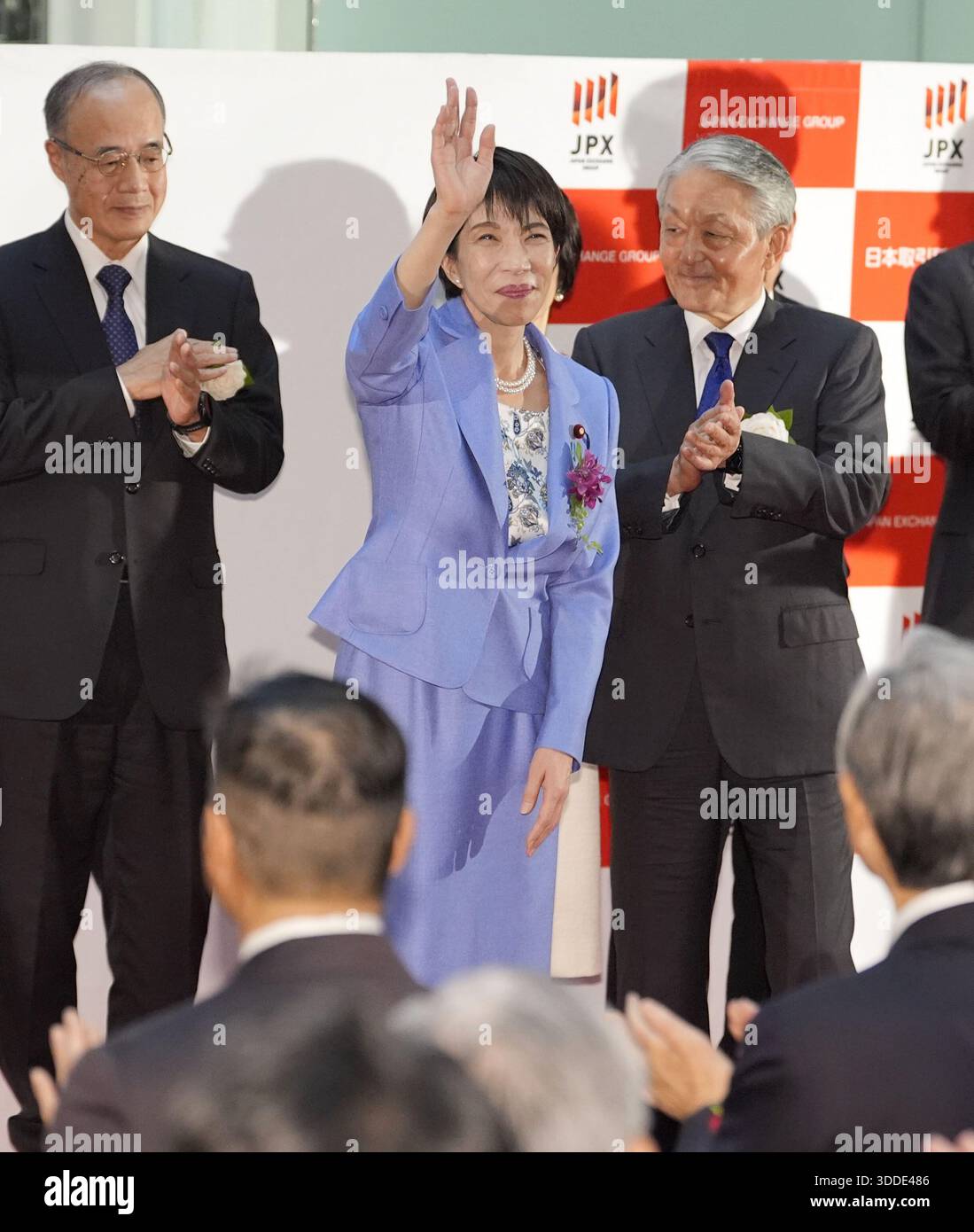 Japanese Prime Minister Sanae Takaichi (C) attends the year-end ...