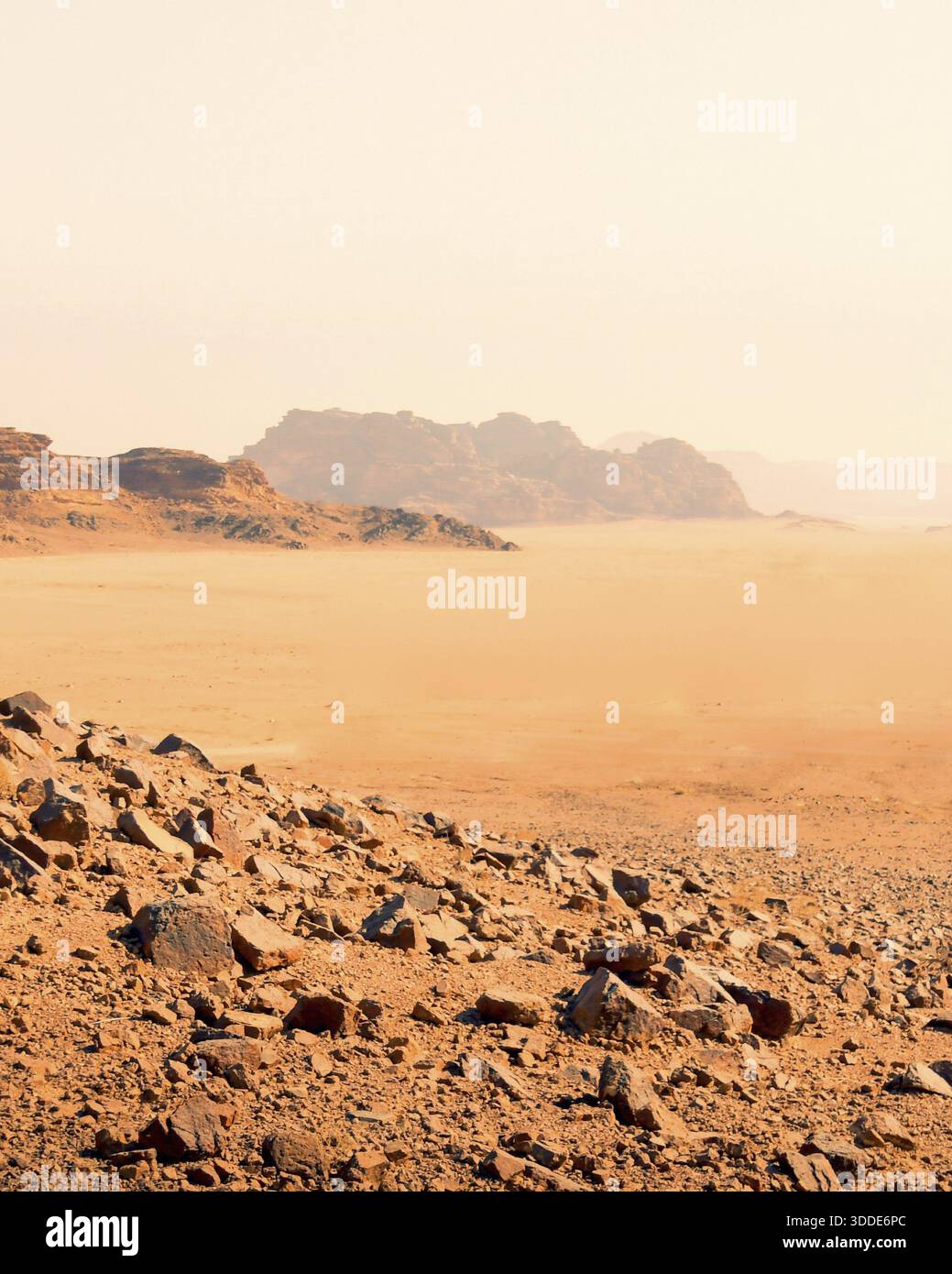 Expansive barren desert of Wadi Rum in Jordan with red sand, rocky ...