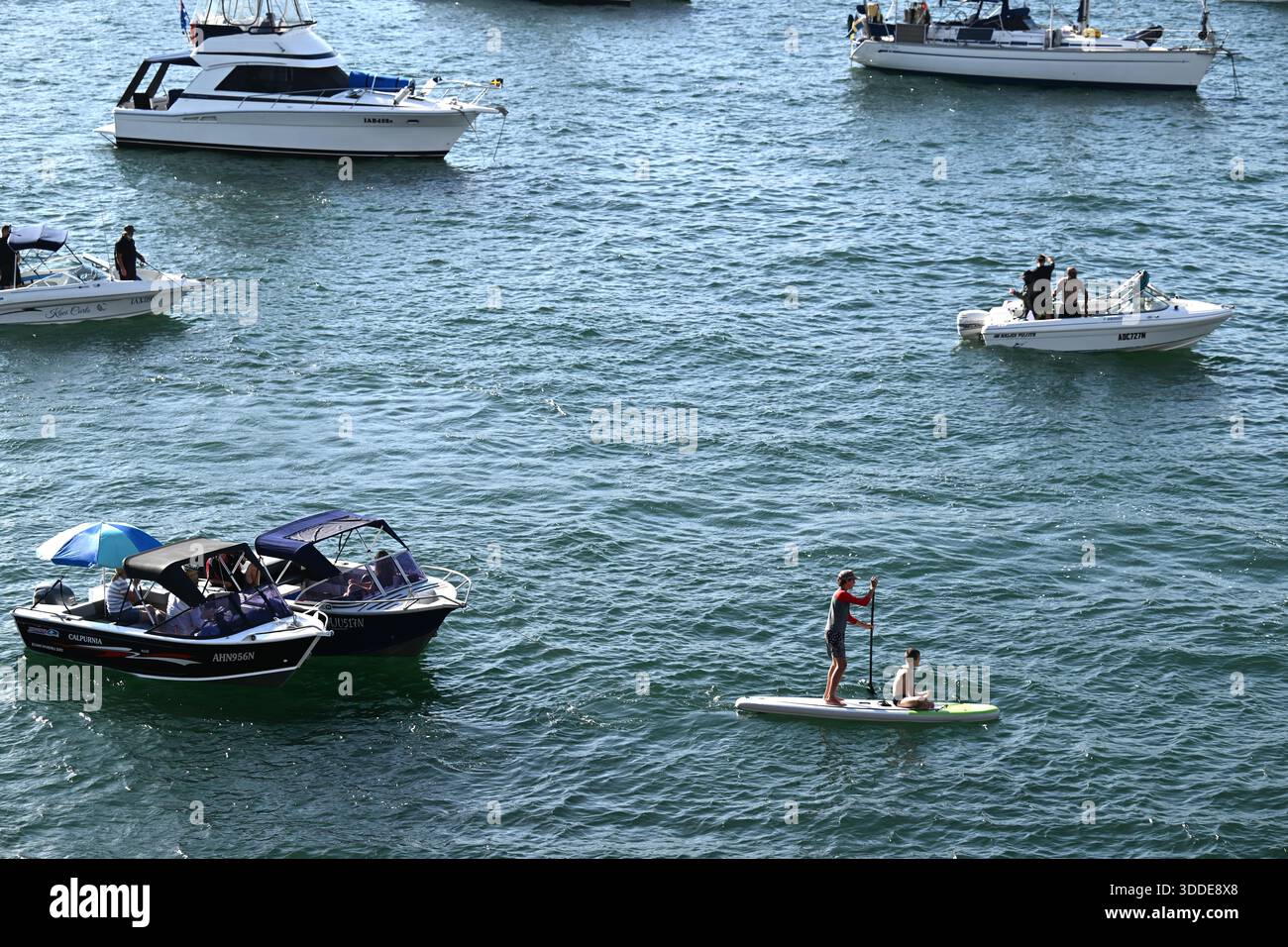 Spectators on watercraft are seen ahead of the fireworks display during ...