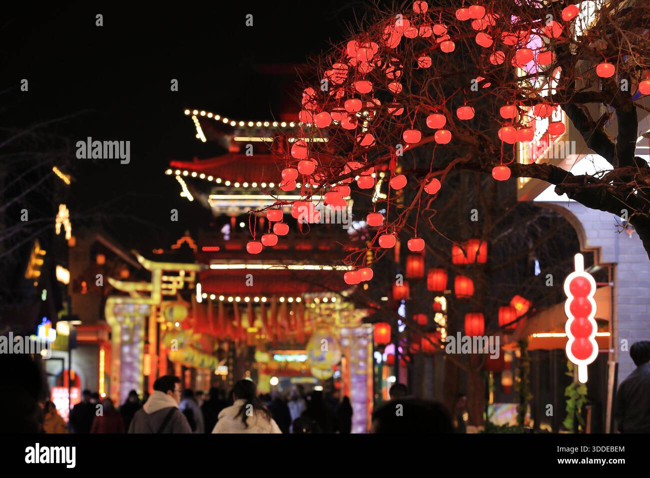 Visitors enjoy lantern displays at Lanzhou Old Street in Qilihe ...