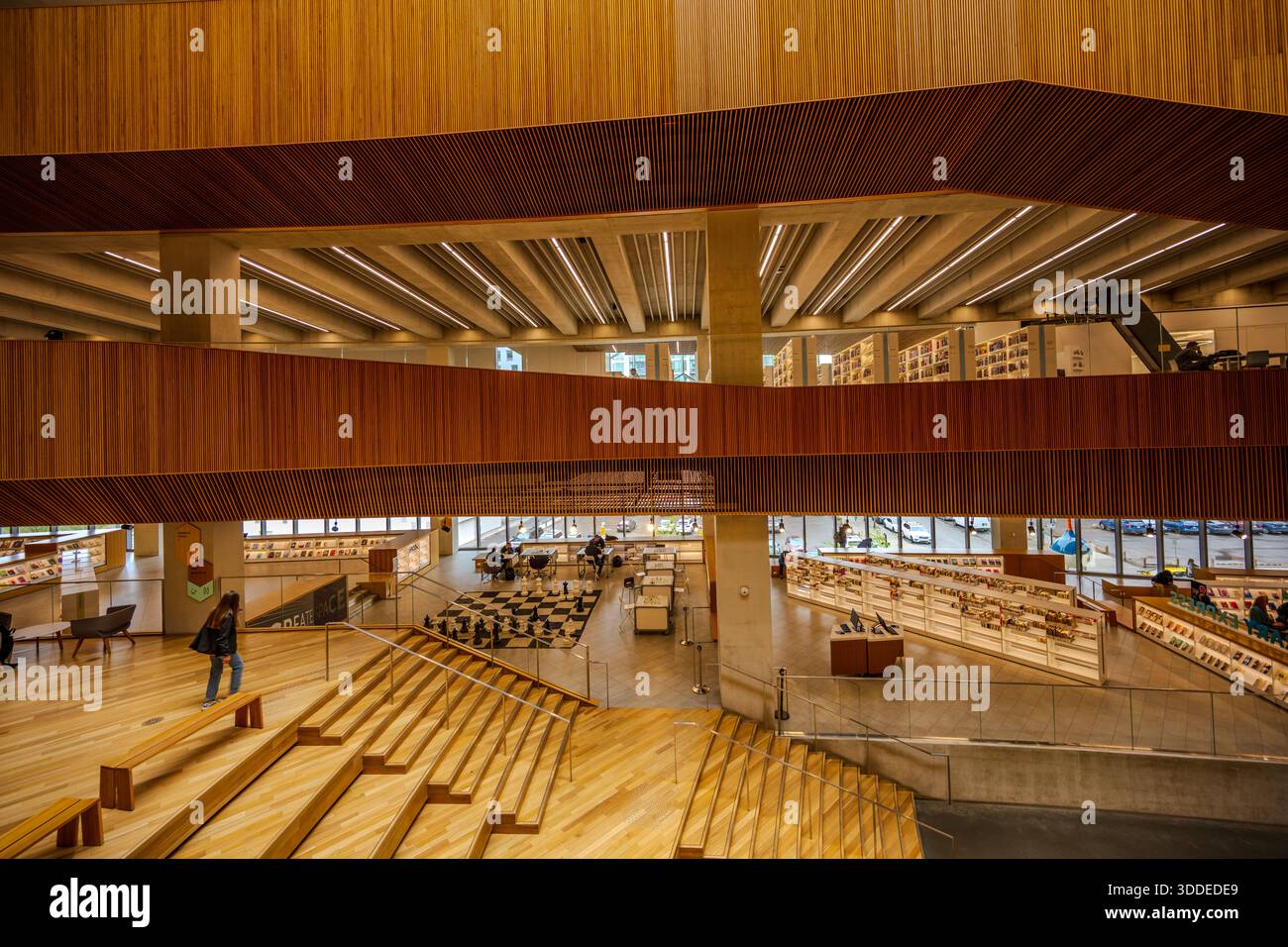 Wide view of the multi-level Calgary Central Library interior with ...