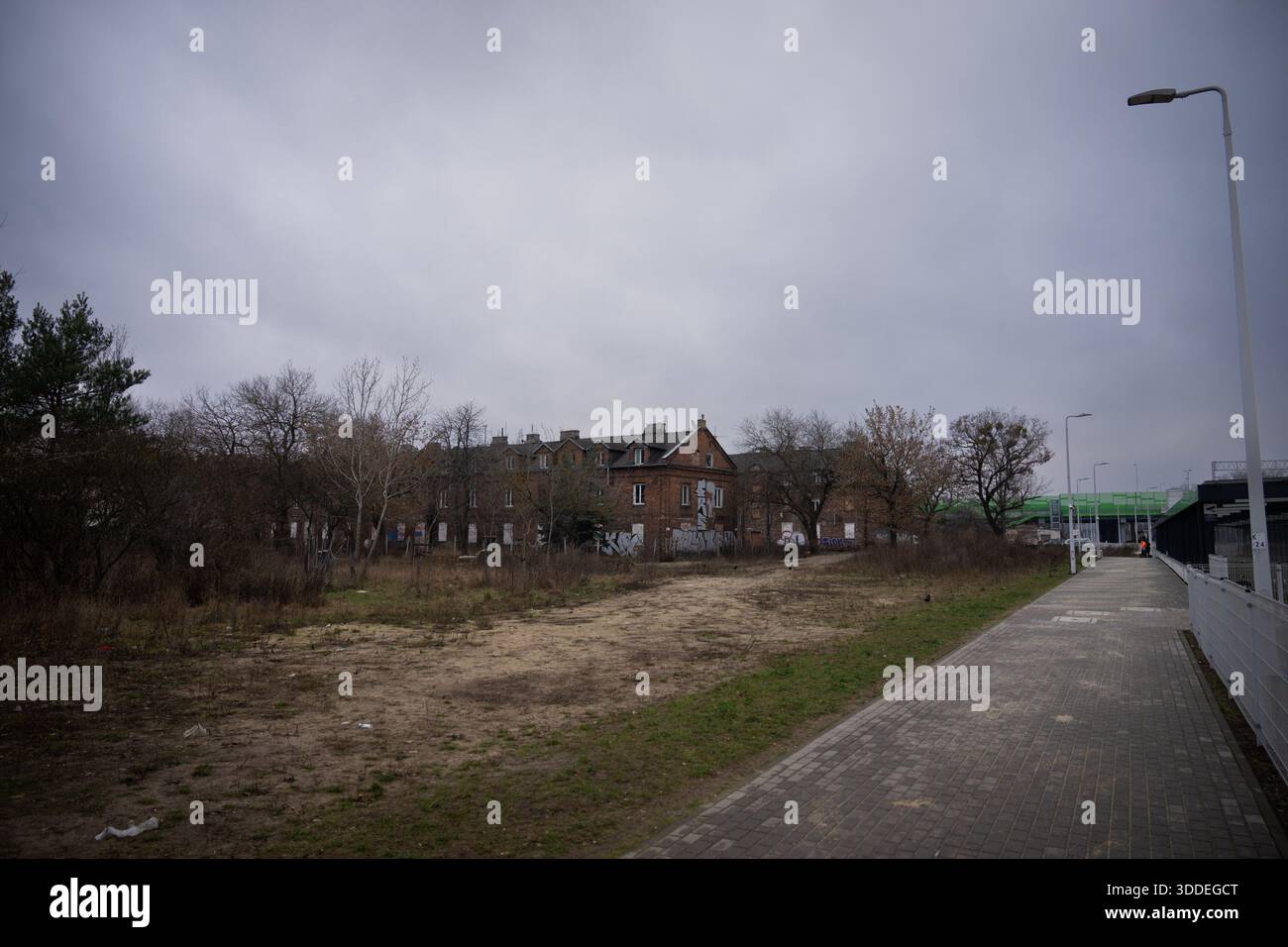 Dilapidated brick houses with grafitti on them are seen in Warsaw ...