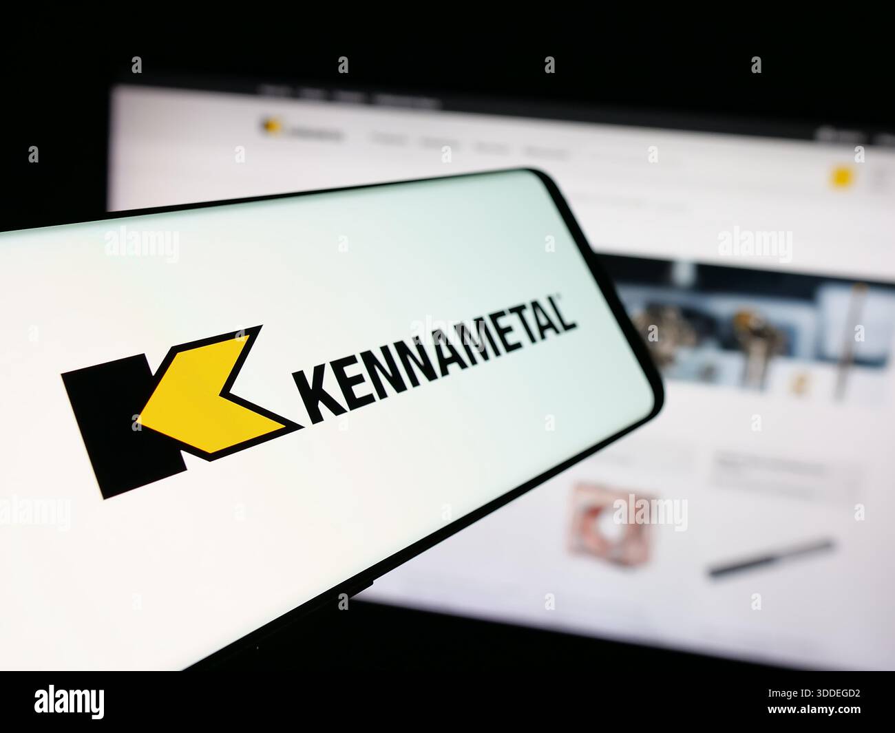 In this photo illustration, a smartphone with the logo of US cutting ...