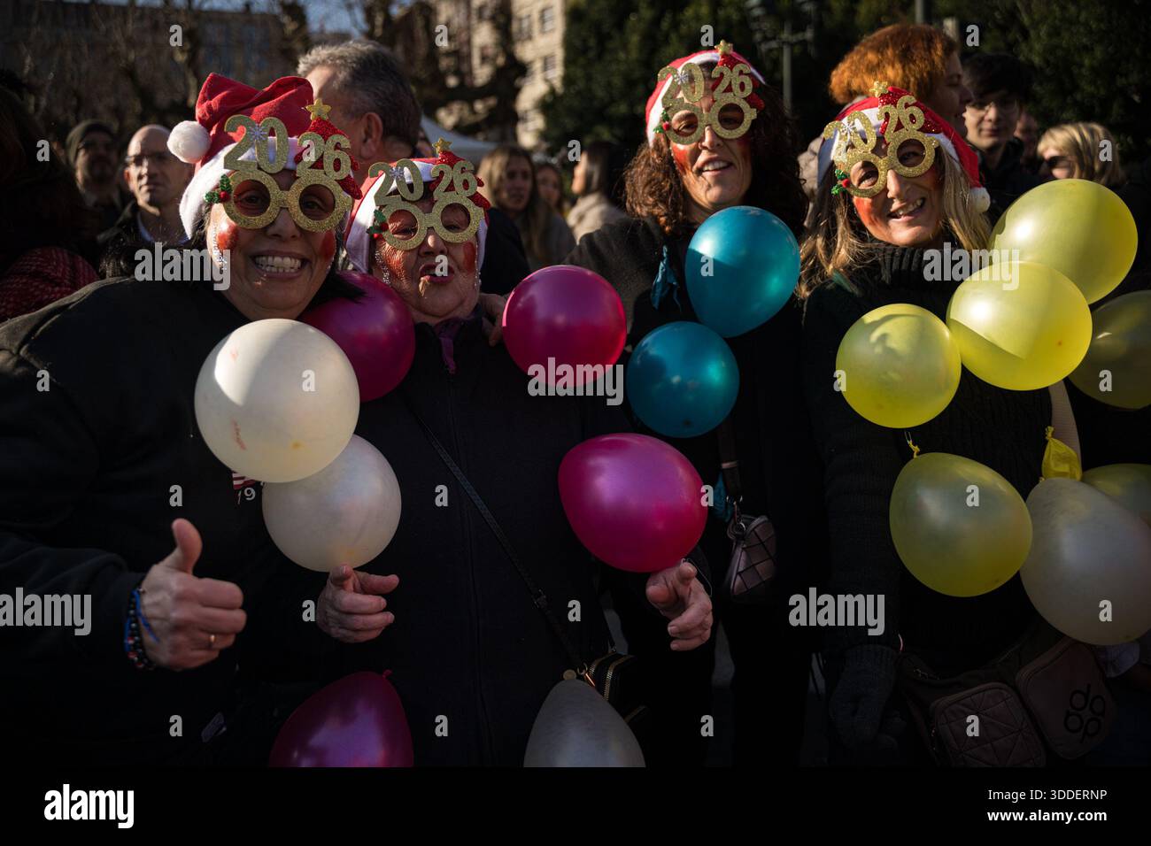 Dozens of people during the XXV anniversary of 'la toma das uvas' in ...