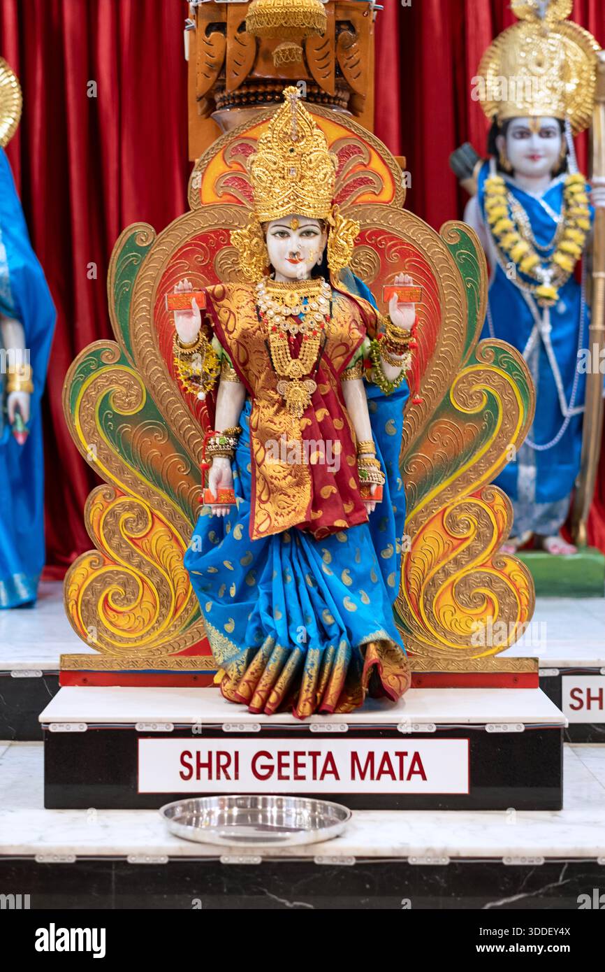 An ornate statue of Shri Geeta Mata, a Hindu goddess and the ...