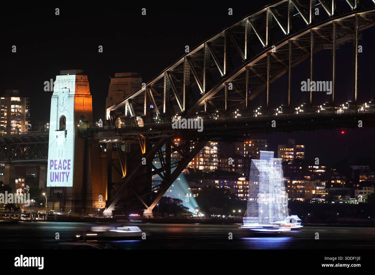A message of peace and unity is projected on to Sydney Harbour Bridge ...
