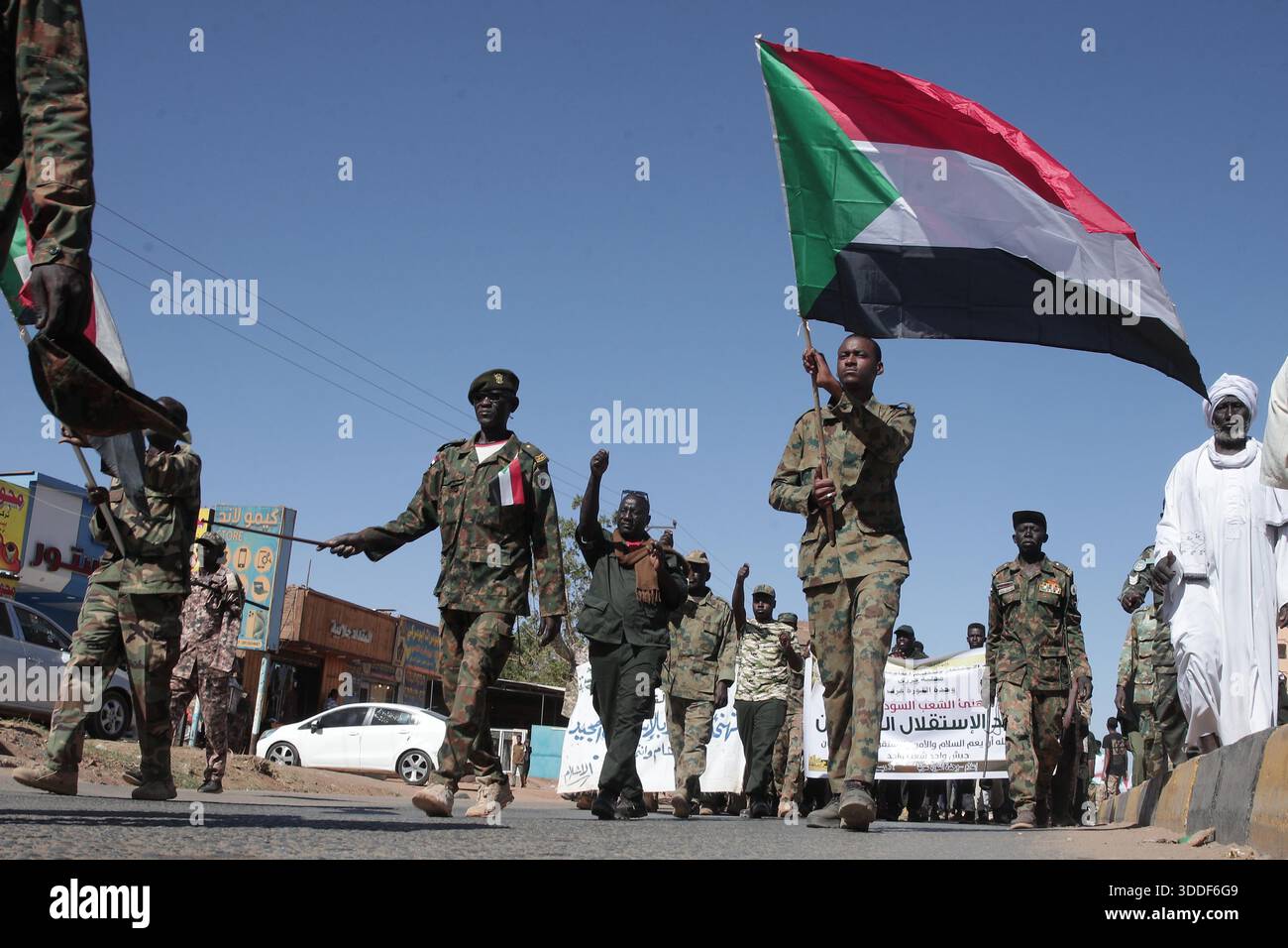 Sudanese army soldiers parade in the streets of Omdurman, a district of ...