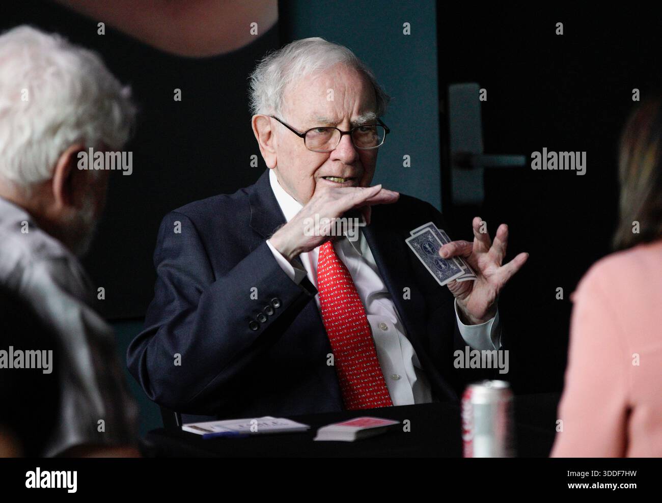 FILE - Warren Buffett, chairman and CEO of Berkshire Hathaway, gestures ...