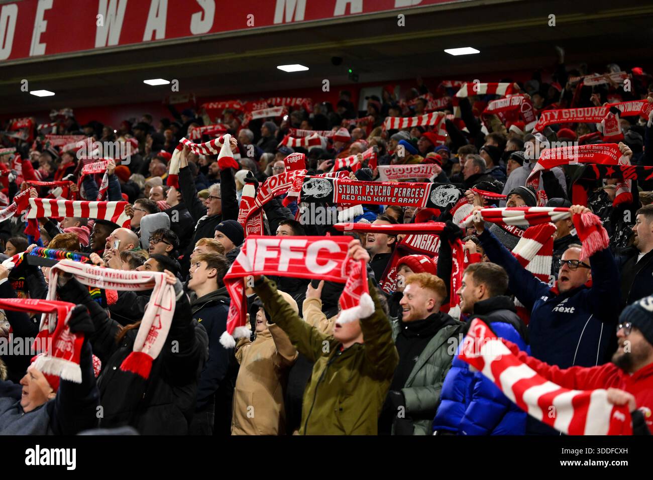 Forest supporters hold up scarfs during the Premier League match ...