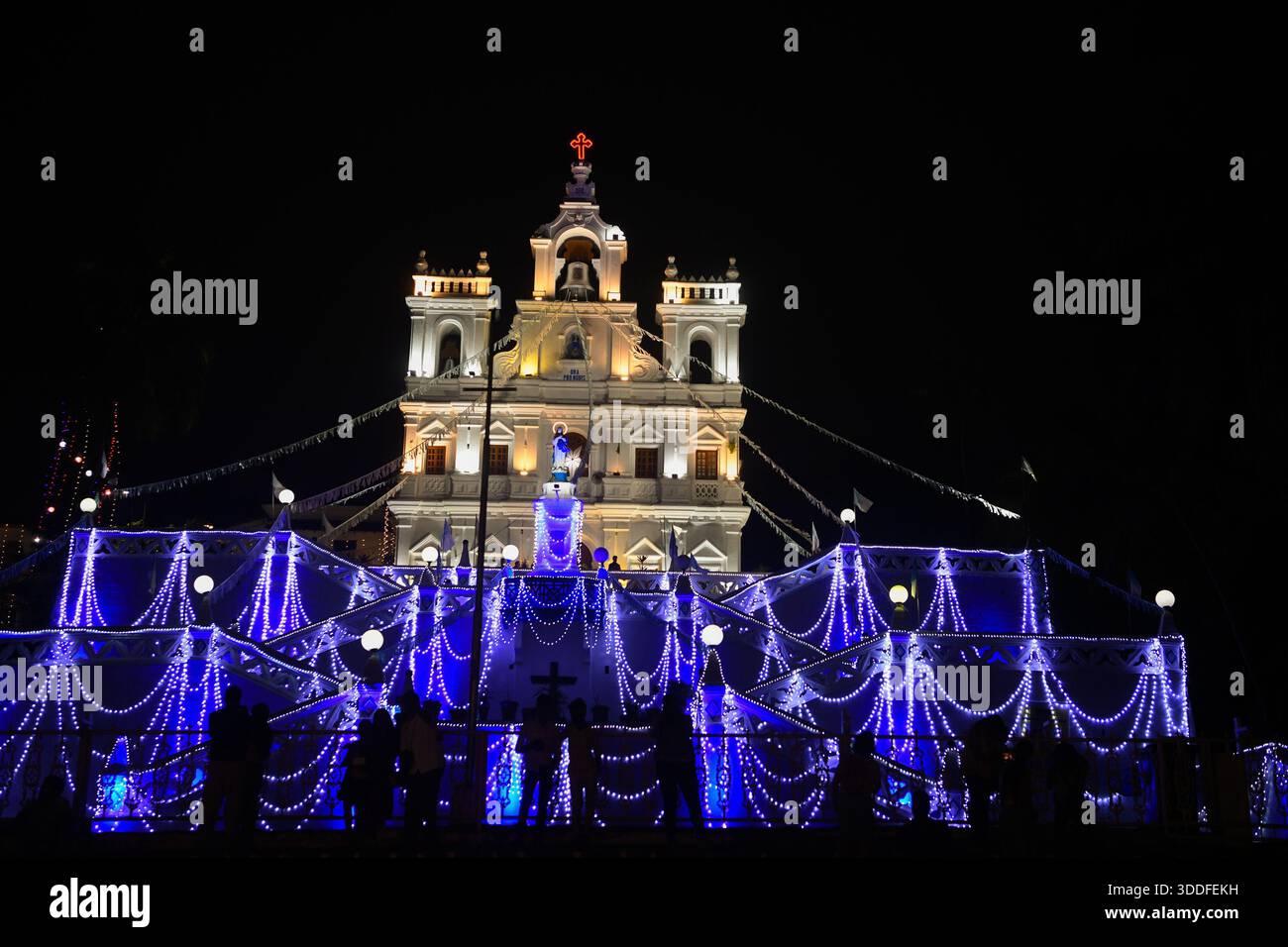 People stand near the decorations outside The Our Lady of the ...
