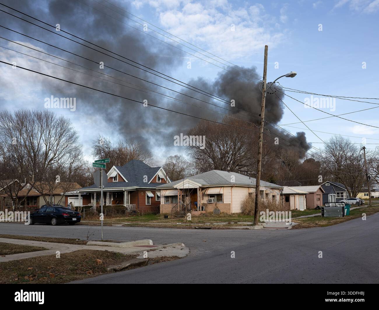 Smoke from house on fire in the Commercial Street historic district of ...