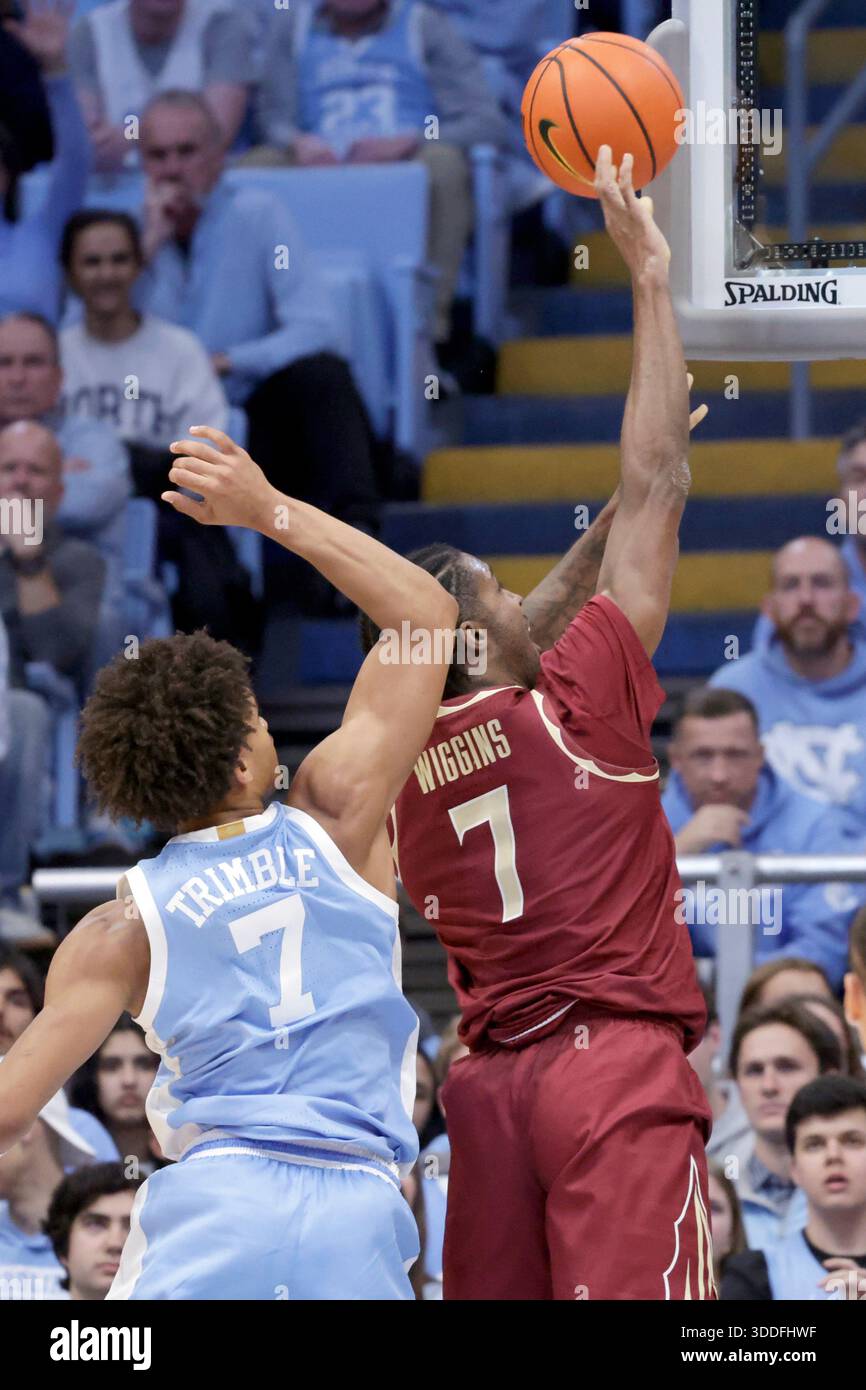Florida State forward Chauncey Wiggins, right, drives to the hoop ...