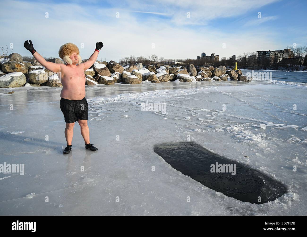 Mark Nikiforov reacts following his polar plunge in the St. Lawerence ...