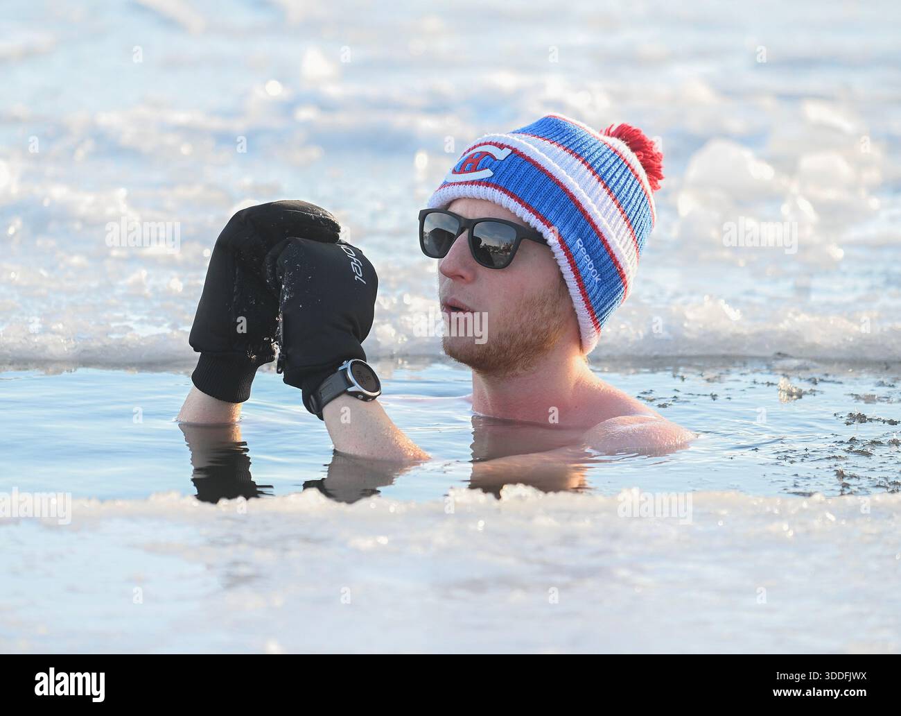 Spencer Levine exhales as he takes a polar plunge in the St. Lawrence ...