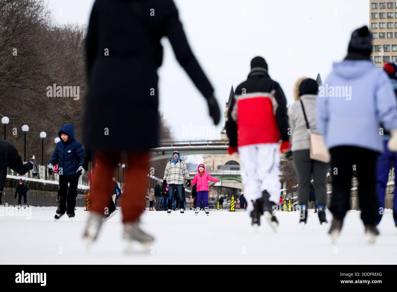 Skaters skate along the Rideau Canal Skateway during the first official ...