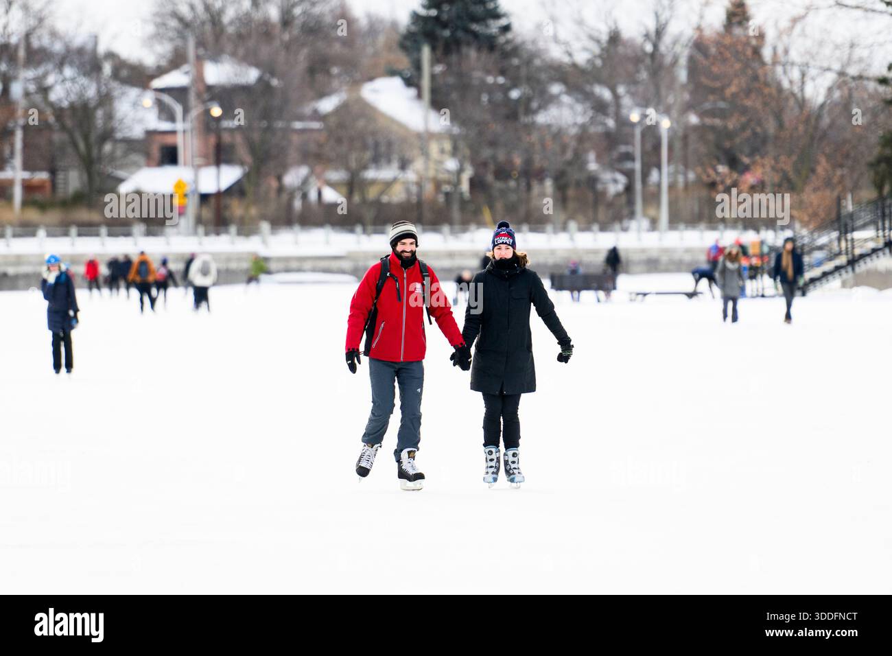 Skaters skate along the Rideau Canal Skateway during the first official ...