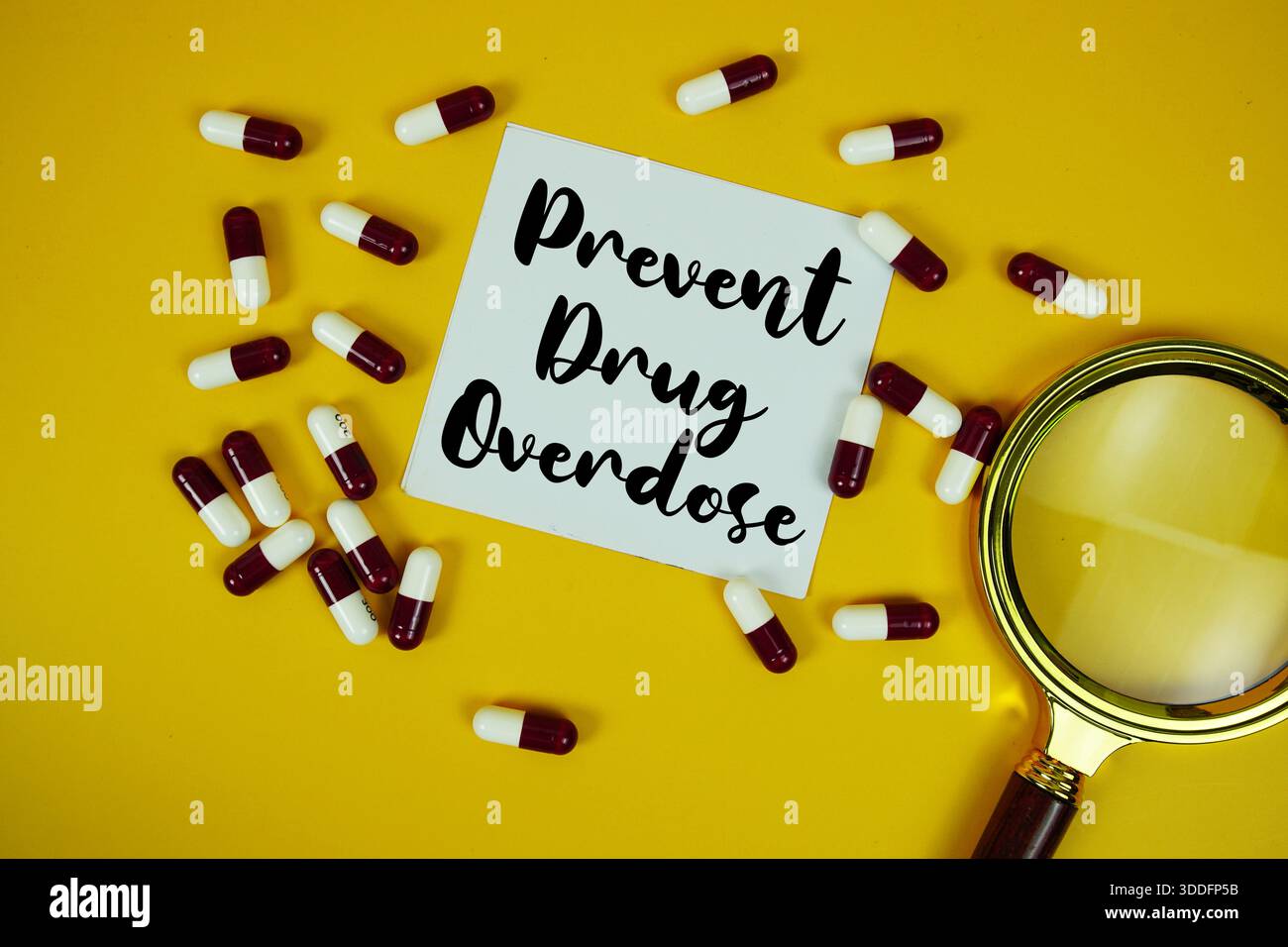 Prevent Drug Overdose with medicine capsule and magnifying glass on ...