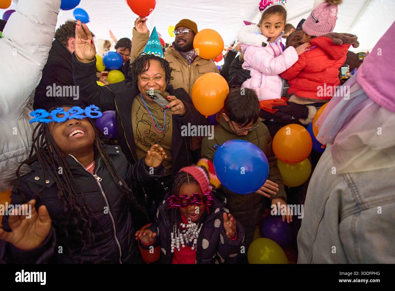 Cori Johnson, 9, left, her mother Robin Hawkins-Johnson, and friend ...