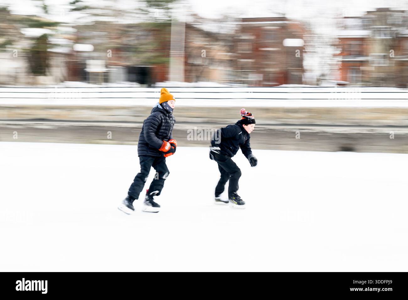 Skaters skate along the Rideau Canal Skateway during the first official ...
