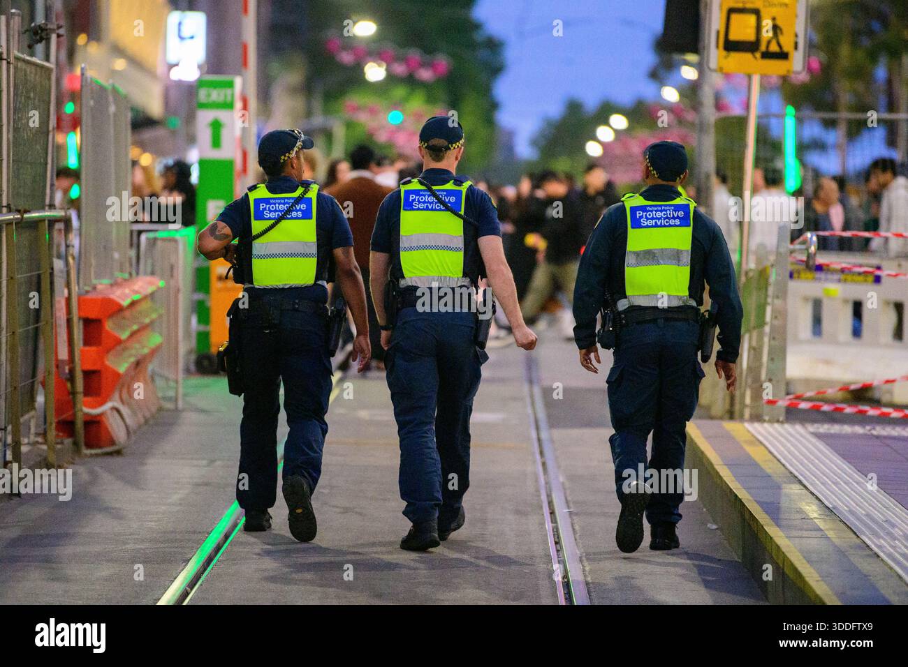 Victoria Police Protective Services Officers patrol a closed section of ...