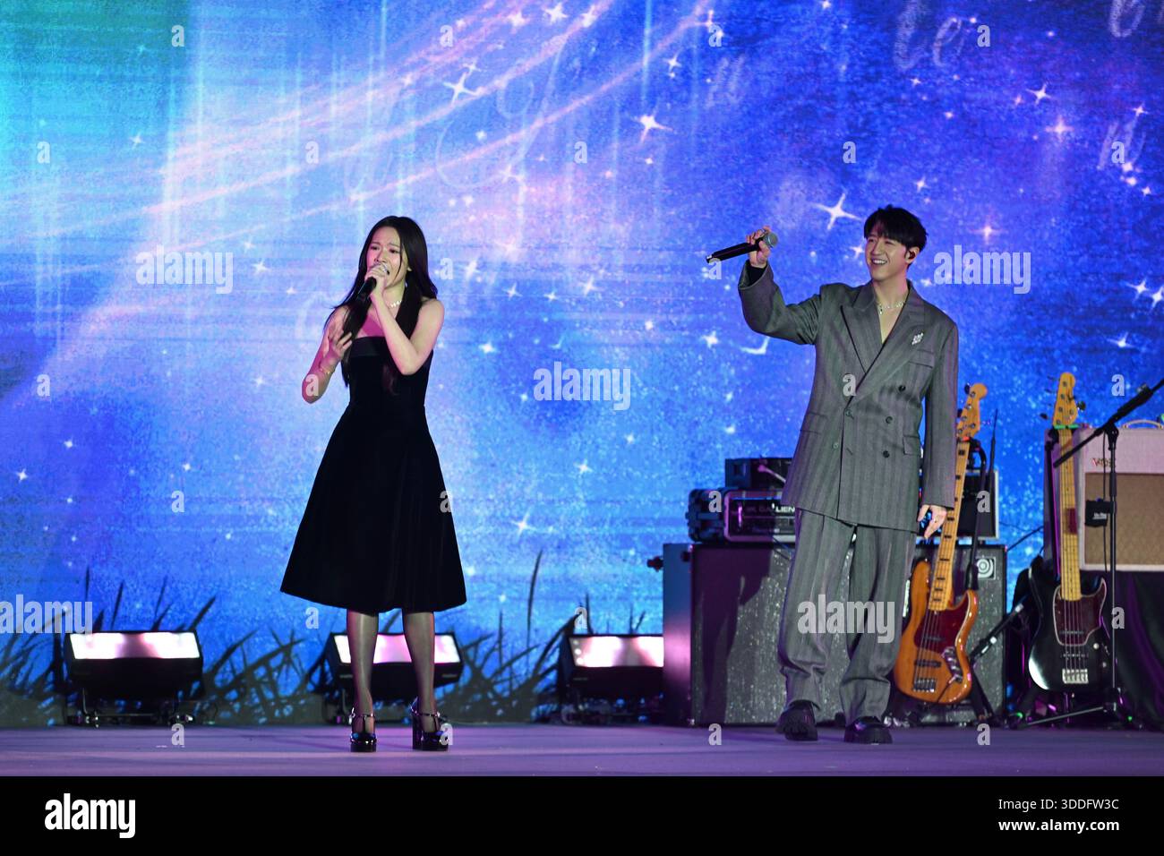 Cloud Wan Ho-ying(L) and Jay Fung, the Hong Kong singer, singing on the ...