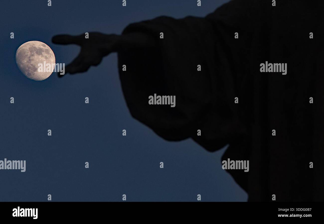 Brescia , Italy. 31th December 2025. The Moon is seen above the ...