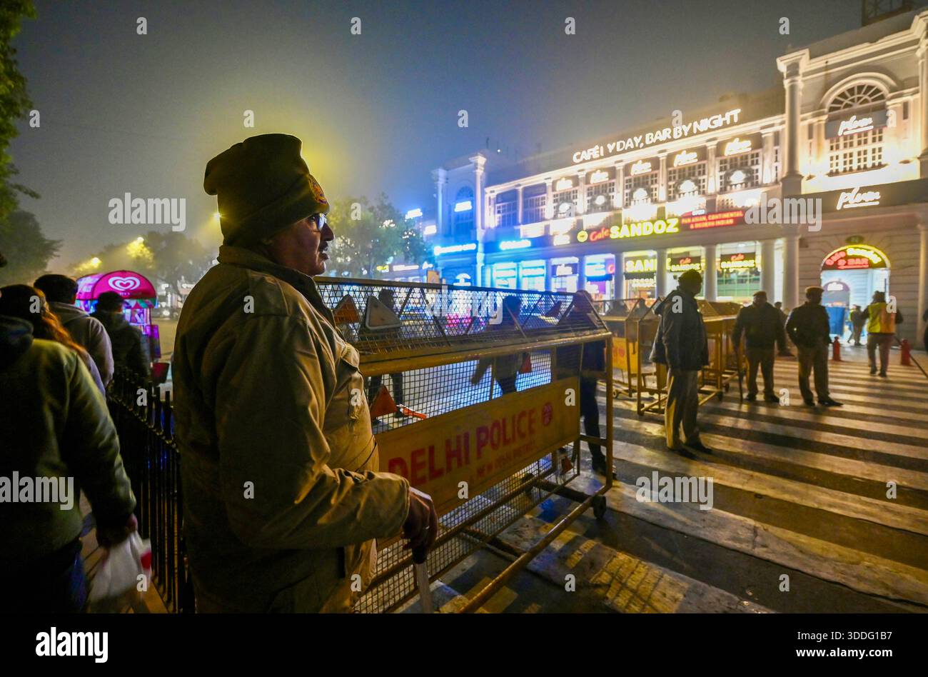 NEW DELHI, INDIA - DECEMBER 31: Delhi Police personnel barricade ...