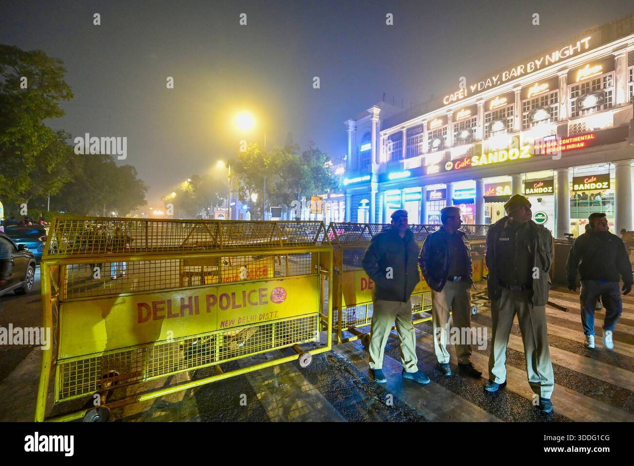 NEW DELHI, INDIA - DECEMBER 31: Delhi Police personnel barricade ...