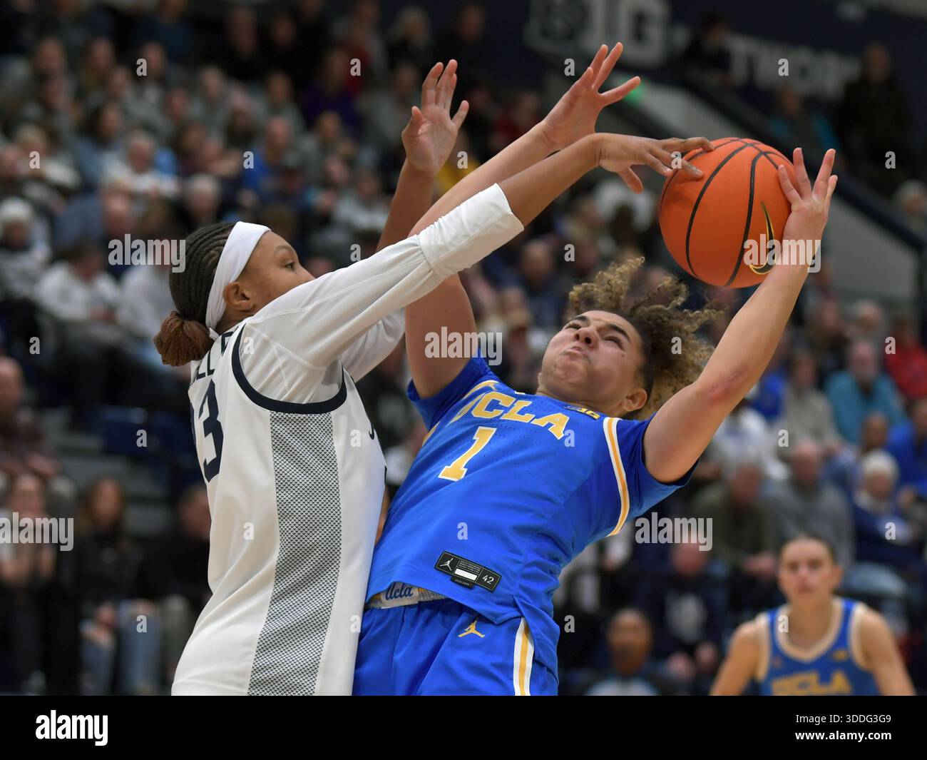 Penn State's Kiyomi McMiller,left, blocks a shot by UCLA's Kiki Rice (1 ...