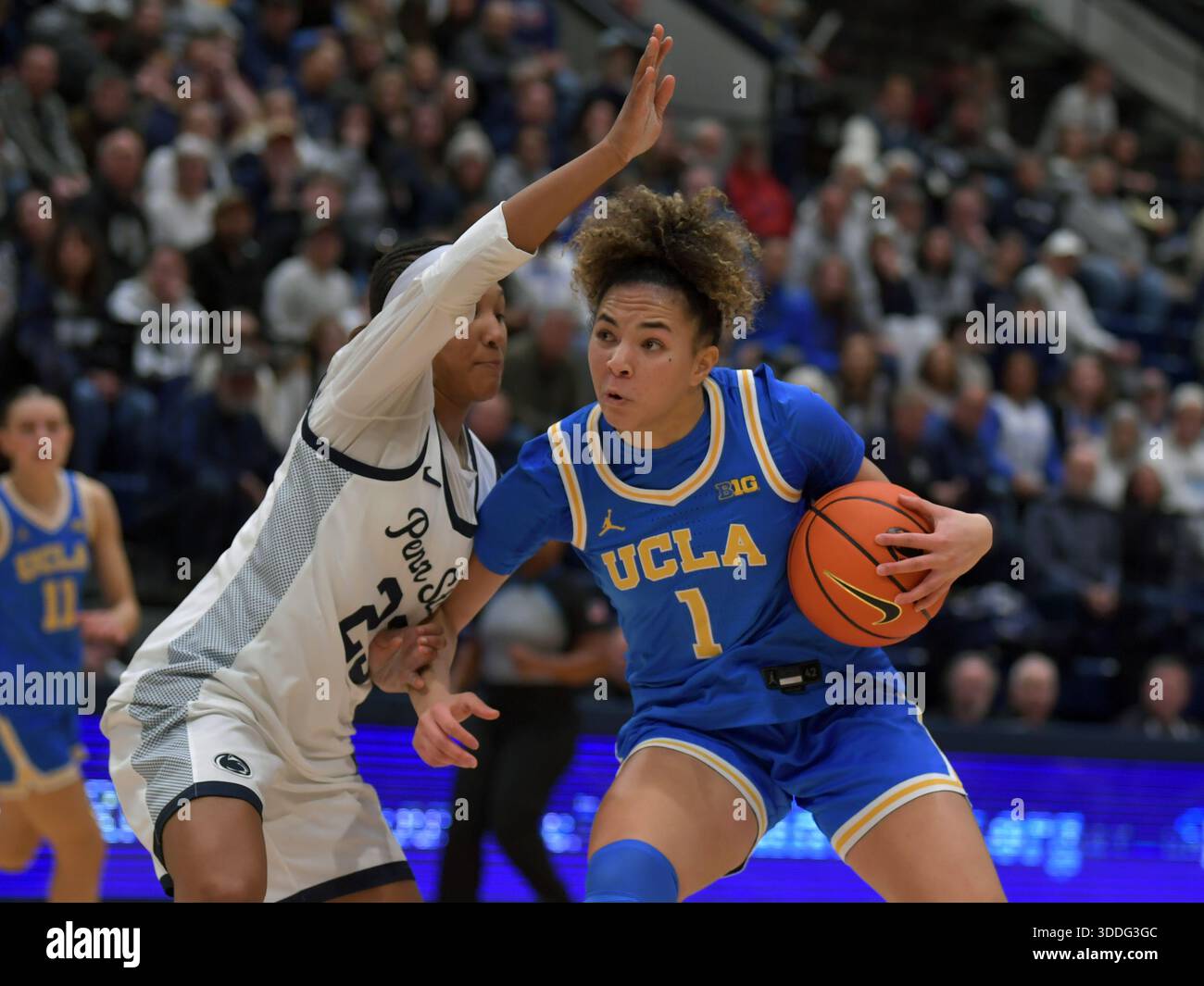 UCLA's Kiki Rice (1) pulls up to shoot on Penn State's Kiyomi McMiller ...