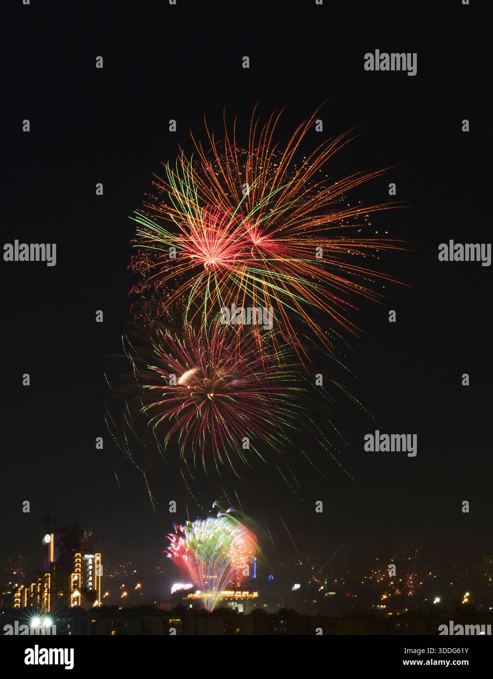 In this image shot with a slow shutter speed, fireworks light up the ...