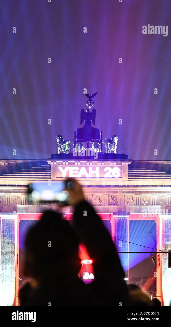 01 January 2026, Berlin: A participant takes photos at the "Yeah 26 ...