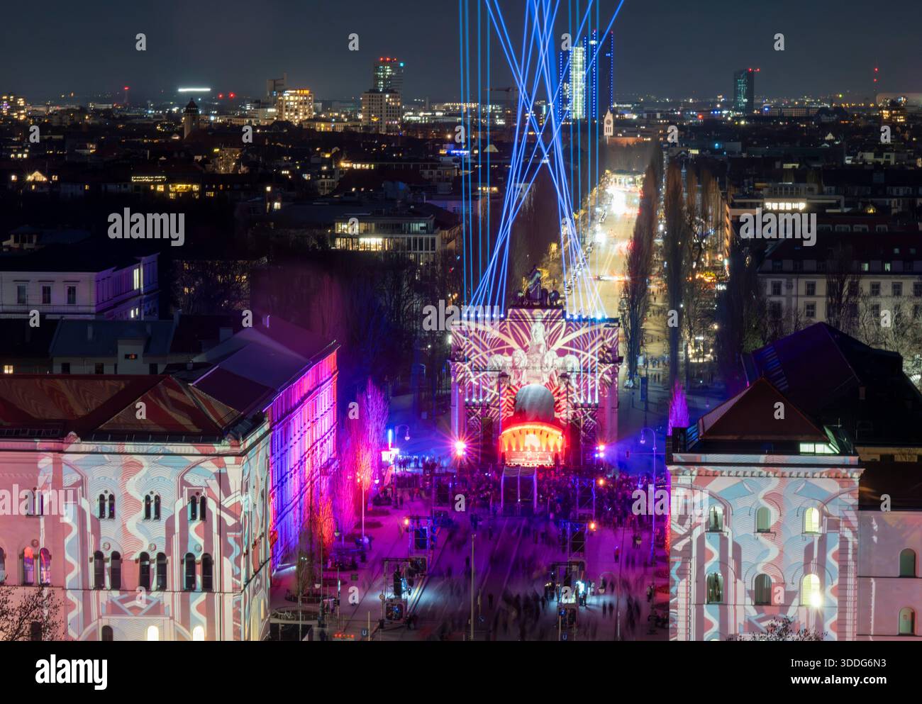 31 December 2025, Bavaria, Munich: A laser show can be seen on the New ...