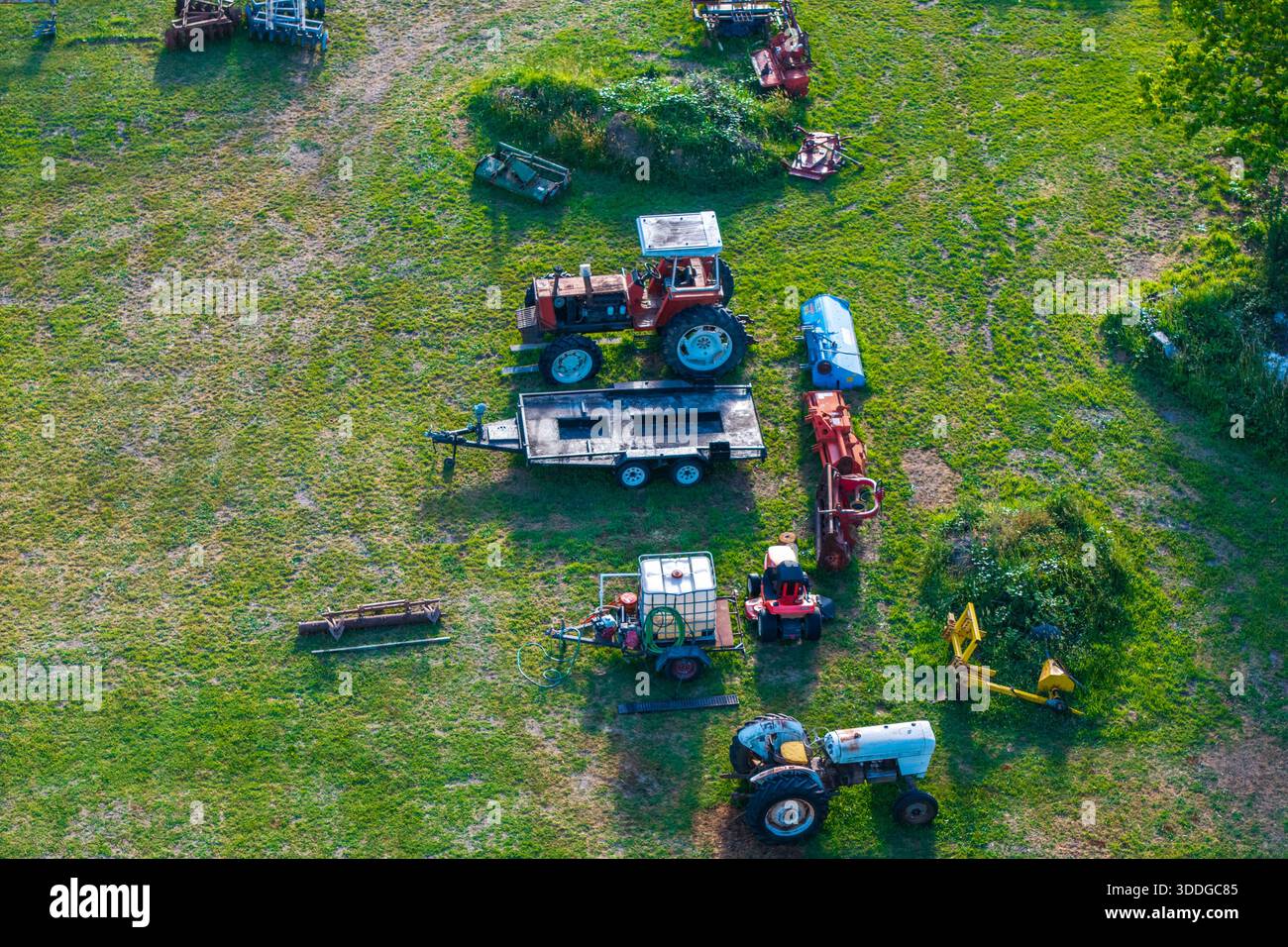 Drone captures tractor plowing field hi-res stock photography and ...