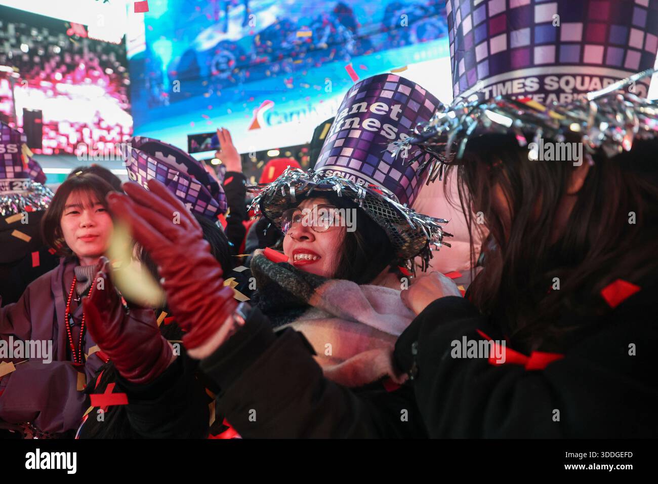 Revelers celebrate during New Year's Eve in Times Square, Wednesday ...