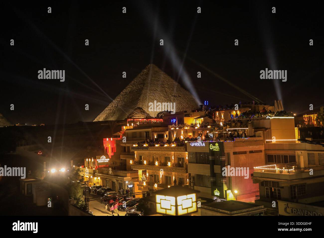 Fireworks light up the sky above the Great Pyramids of Giza, on the ...