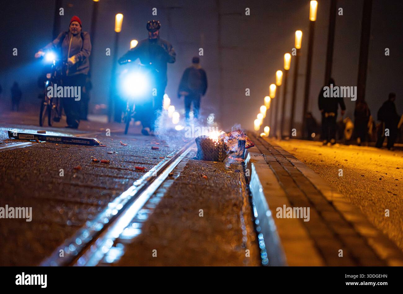 01 January 2026, North Rhine-Westphalia, Bonn: A firework battery burns ...