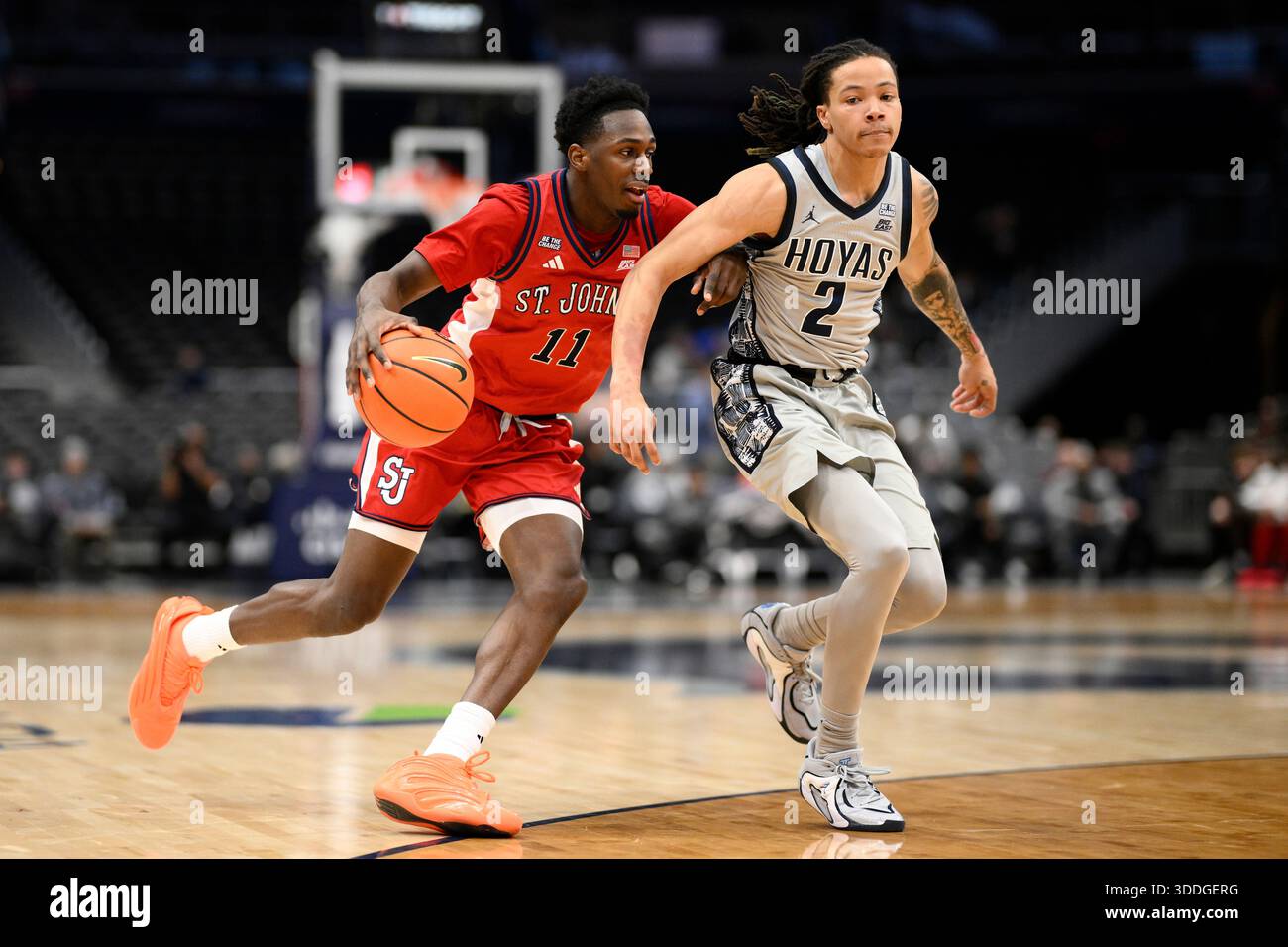 St. John's guard Ian Jackson (11) dribbles the ball against Georgetown ...