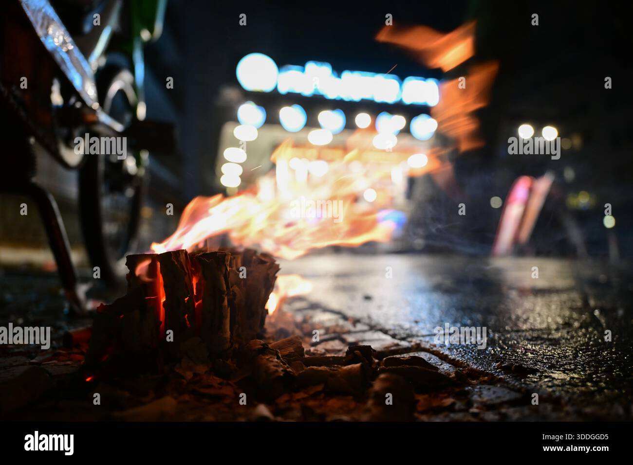 01 January 2026, Berlin: Remains of New Year's Eve fireworks burn ...