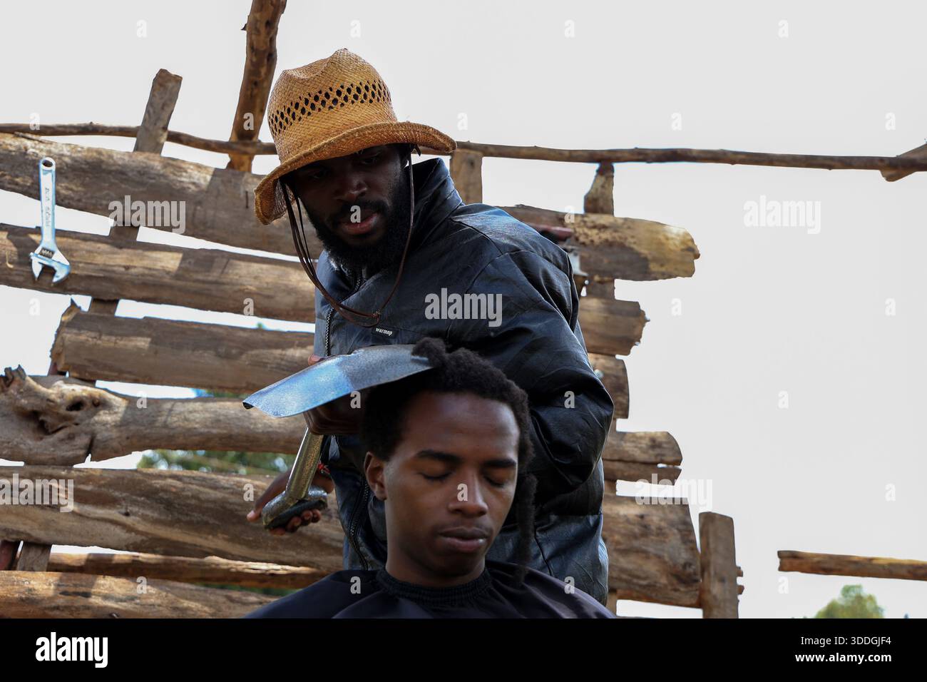 Safari Martins, a barber known for using unusual tools in his videos ...