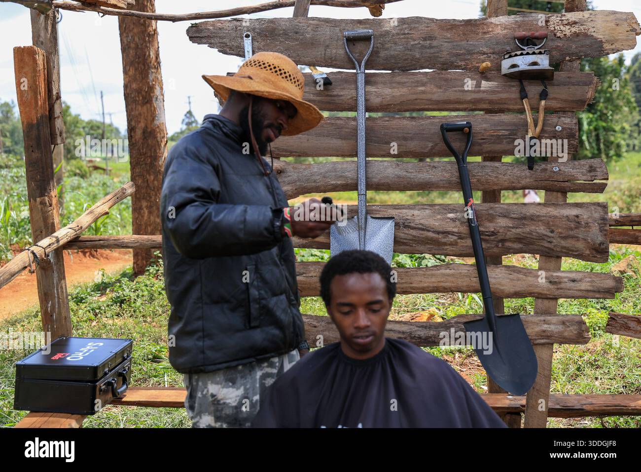 Safari Martins, a barber whose creative techniques have gained him an ...