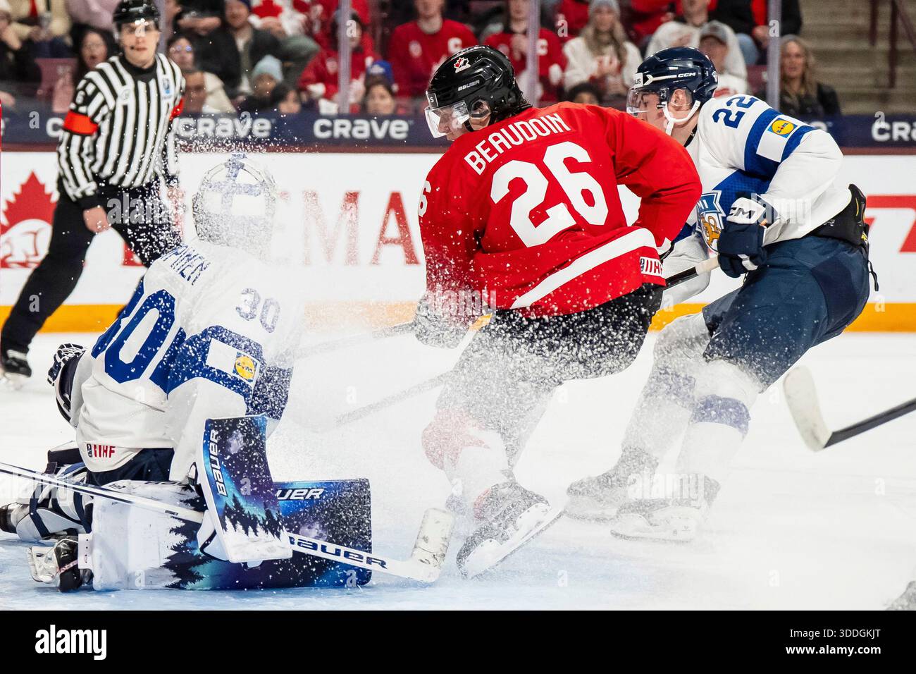 Canada's Cole Beaudoin (26) scores on Finland goaltender Petteri ...