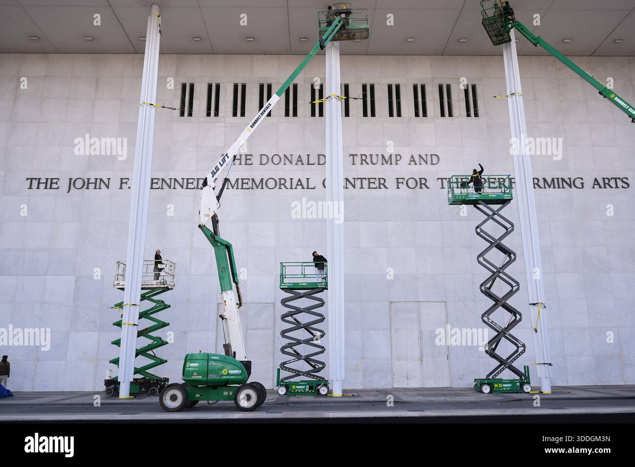 FILE - New signage, The Donald J. Trump and The John F. Kennedy ...
