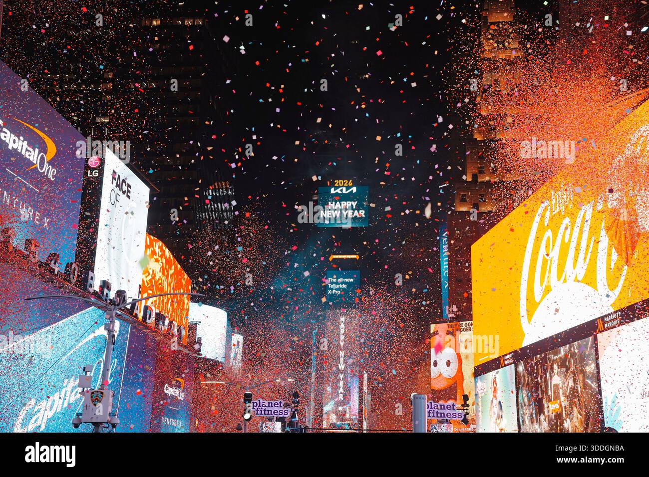 Confetti is released from the rooftops of buildings throughout Times ...