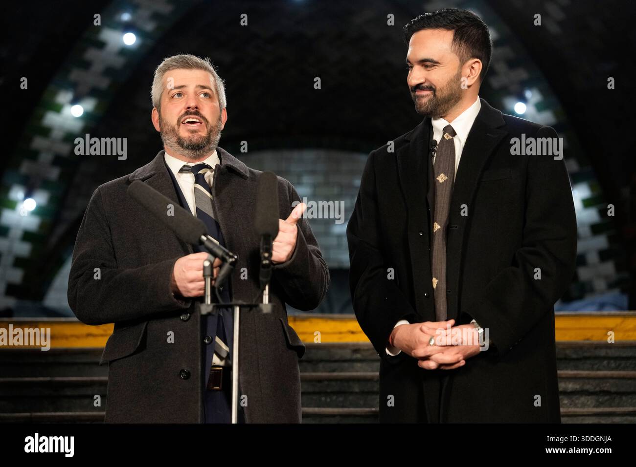 Mike Flynn, left, speaks after being introduced by Mayor Zohran Mamdani ...